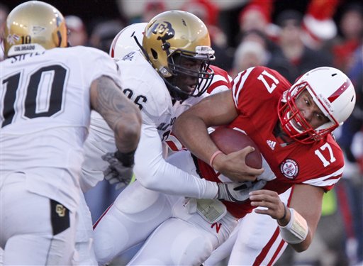 Nebraska beats Buffs 45-17, wins B12 North title