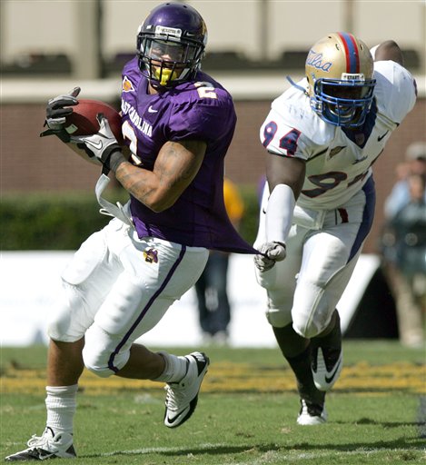 Davis' dramatic TD lifts ECU past Tulsa 51-49